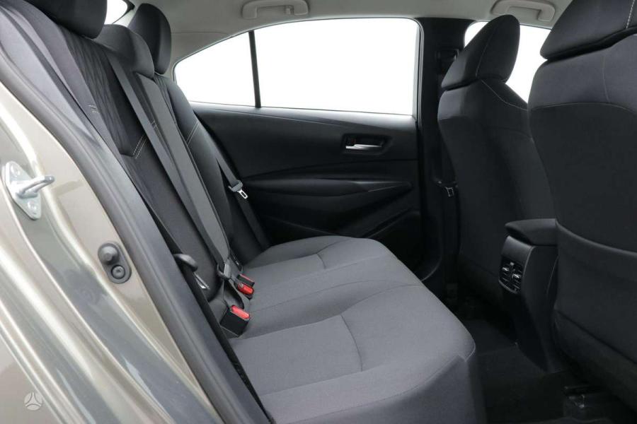 Green Toyota Corolla 2021 in Vilnius, with an engine capacity of 1.49 L and mileage of 77 thousand km for 16900 €, photo 11 on AUTOMOTO.COM.LV