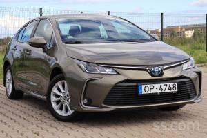 Green Toyota Corolla 2022 in Riga, with an engine capacity of 1.80 L and mileage of 167 thousand km for 15900 €, photo  on AUTOMOTO.COM.LV
