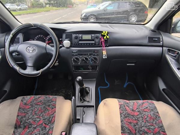 Zaļš Toyota Corolla 2003 Kauņa, ar dzinēja tilpumu 1.40 L un nobraukumu 185 tūkst. km par 1650 €, foto 9 vietnē AUTOMOTO.COM.LV