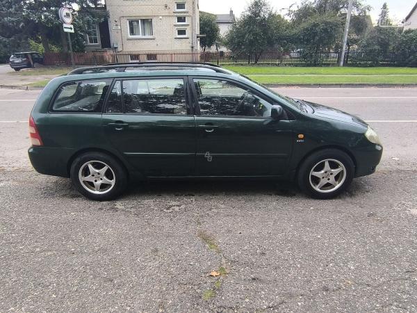 Zaļš Toyota Corolla 2003 Kauņa, ar dzinēja tilpumu 1.40 L un nobraukumu 185 tūkst. km par 1650 €, foto 6 vietnē AUTOMOTO.COM.LV