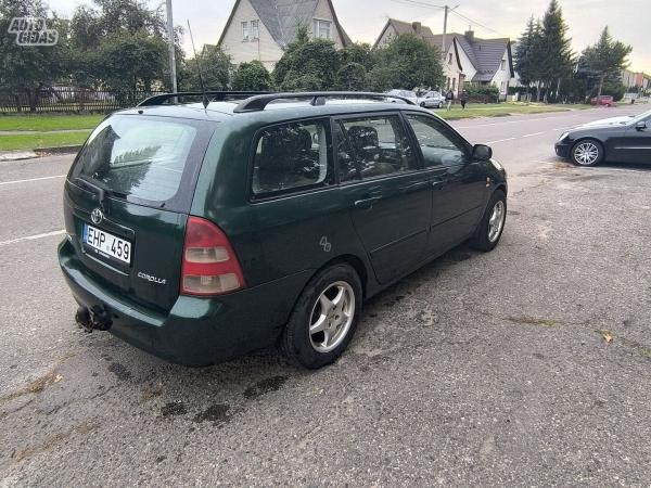 Zaļš Toyota Corolla 2003 Kauņa, ar dzinēja tilpumu 1.40 L un nobraukumu 185 tūkst. km par 1650 €, foto 9 vietnē AUTOMOTO.COM.LV