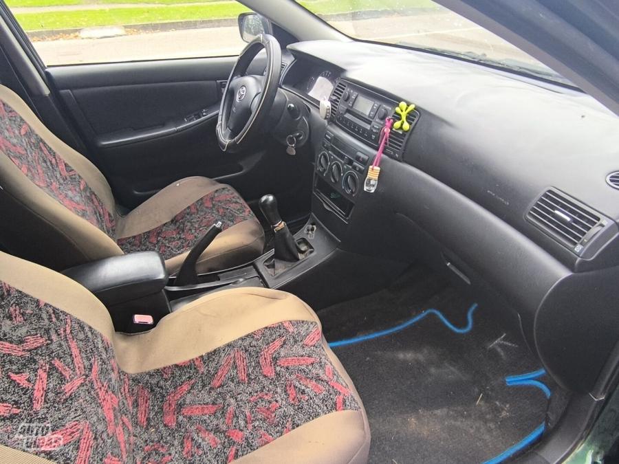 Zaļš Toyota Corolla 2003 Kauņa, ar dzinēja tilpumu 1.40 L un nobraukumu 185 tūkst. km par 1650 €, foto 12 vietnē AUTOMOTO.COM.LV