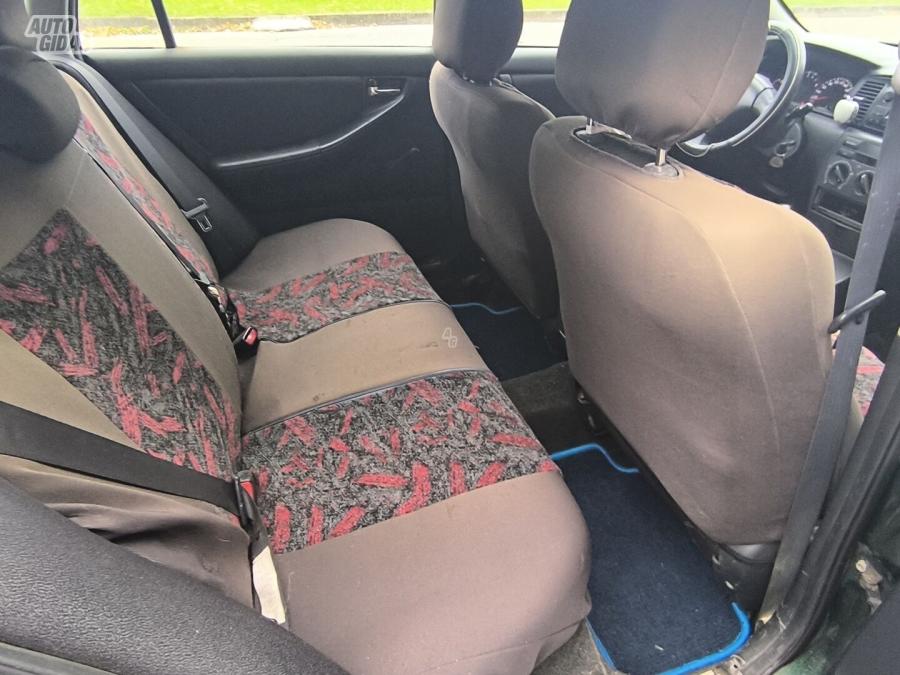 Zaļš Toyota Corolla 2003 Kauņa, ar dzinēja tilpumu 1.40 L un nobraukumu 185 tūkst. km par 1650 €, foto 13 vietnē AUTOMOTO.COM.LV