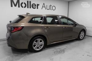 Green Toyota Corolla 2021 in Vilnius, with an engine capacity of 1.20 L and mileage of 140 thousand km for 13650 €, photo 5 on AUTOMOTO.COM.LV