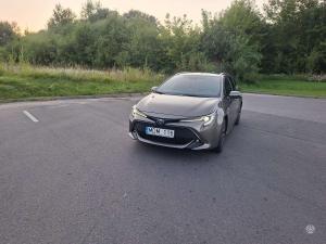 Green Toyota Corolla 2022 in Vilnius, with an engine capacity of 1.80 L and mileage of 99 thousand km for 18200 €, photo 4 on AUTOMOTO.COM.LV