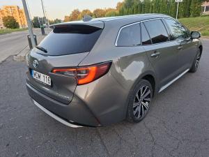 Green Toyota Corolla 2022 in Vilnius, with an engine capacity of 1.80 L and mileage of 99 thousand km for 18200 €, photo 7 on AUTOMOTO.COM.LV