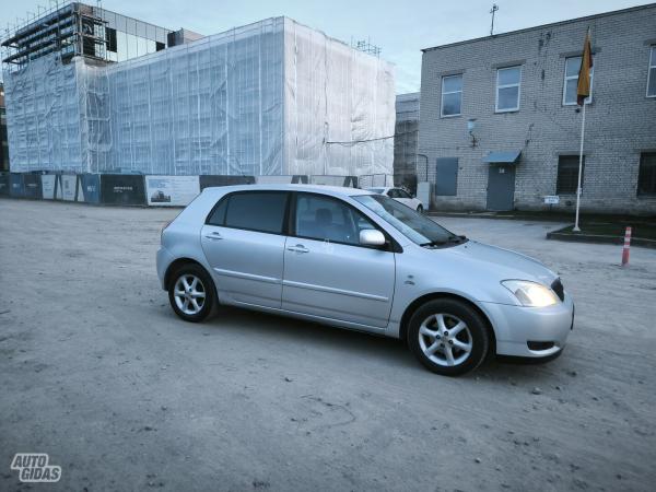 Grey Toyota Corolla 2002 in Kaunas, with an engine capacity of 2.00 L and mileage of 270 thousand km for 1000 €, photo 3 on AUTOMOTO.COM.LV