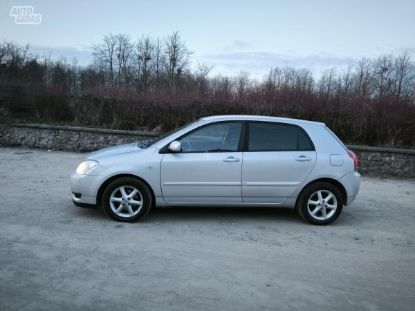 Grey Toyota Corolla 2002 in Kaunas, with an engine capacity of 2.00 L and mileage of 270 thousand km for 1000 €, photo 7 on AUTOMOTO.COM.LV