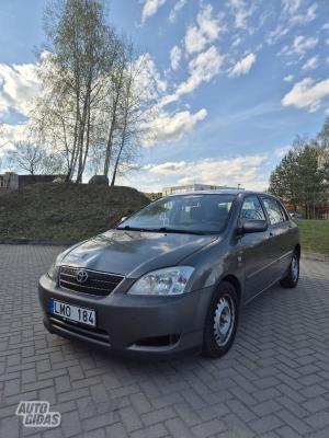 Grey Toyota Corolla 2002 in Vilnius, with an engine capacity of 2.00 L and mileage of 262 thousand km for 999 €, photo  on AUTOMOTO.COM.LV