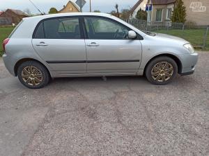 Grey Toyota Corolla 2002 in Vilnius, with an engine capacity of 1.40 L and mileage of 220 thousand km for 1000 €, photo  on AUTOMOTO.COM.LV