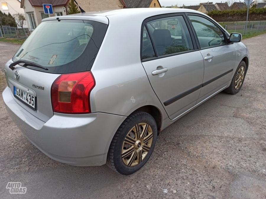 Grey Toyota Corolla 2002 in Vilnius, with an engine capacity of 1.40 L and mileage of 220 thousand km for 1000 €, photo 3 on AUTOMOTO.COM.LV