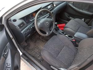 Grey Toyota Corolla 2002 in Vilnius, with an engine capacity of 1.40 L and mileage of 220 thousand km for 1000 €, photo 8 on AUTOMOTO.COM.LV
