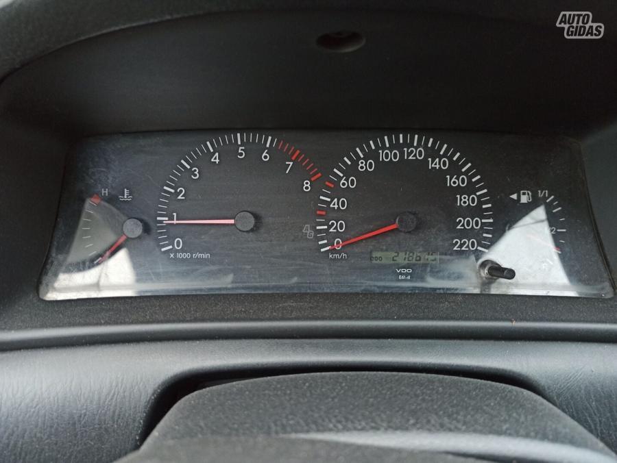 Grey Toyota Corolla 2002 in Vilnius, with an engine capacity of 1.40 L and mileage of 220 thousand km for 1000 €, photo 10 on AUTOMOTO.COM.LV