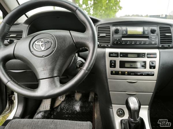 Pelēks Toyota Corolla 2002 Kauņa, ar dzinēja tilpumu 2.00 L un nobraukumu 270 tūkst. km par 700 €, foto 8 vietnē AUTOMOTO.COM.LV