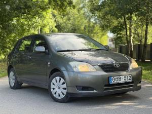 Grey Toyota Corolla 2002 in Vilnius, with an engine capacity of 2.00 L and mileage of 295 thousand km for 1250 €, photo 3 on AUTOMOTO.COM.LV
