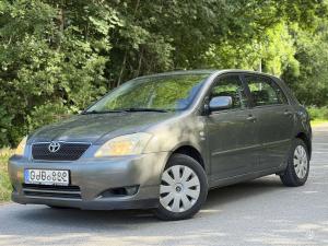 Grey Toyota Corolla 2002 in Vilnius, with an engine capacity of 2.00 L and mileage of 295 thousand km for 1250 €, photo 5 on AUTOMOTO.COM.LV