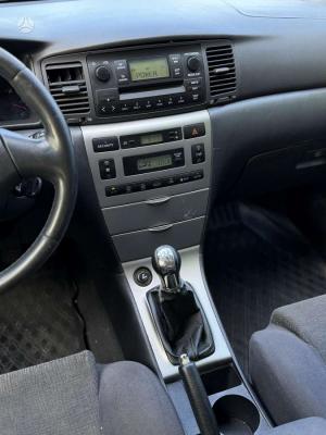 Grey Toyota Corolla 2002 in Vilnius, with an engine capacity of 2.00 L and mileage of 295 thousand km for 1250 €, photo 13 on AUTOMOTO.COM.LV