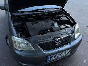 Grey Toyota Corolla 2002 in Vilnius, with an engine capacity of 2.00 L and mileage of 295 thousand km for 1250 €, photo 24 on AUTOMOTO.COM.LV