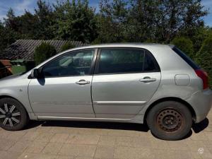 Grey Toyota Corolla 2002 in Vilnius, with an engine capacity of 2.00 L and mileage of 239 thousand km for 950 €, photo 4 on AUTOMOTO.COM.LV