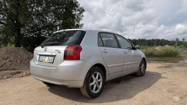 Grey Toyota Corolla 2002 in Vilnius, with an engine capacity of 2.00 L and mileage of 292 thousand km for 1200 €, photo 2 on AUTOMOTO.COM.LV