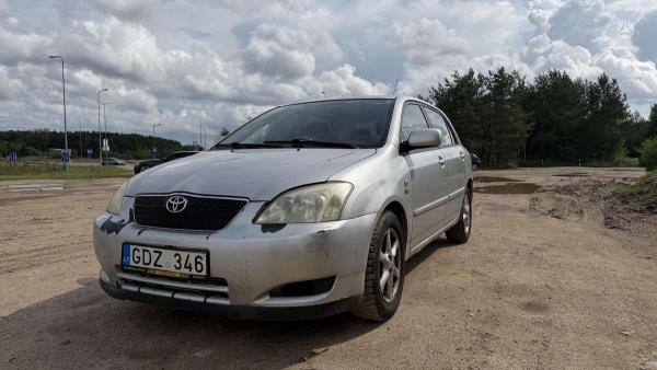 Grey Toyota Corolla 2002 in Vilnius, with an engine capacity of 2.00 L and mileage of 292 thousand km for 1200 €, photo 3 on AUTOMOTO.COM.LV