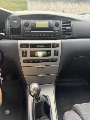 Pelēks Toyota Corolla 2002 Viļņa, ar dzinēja tilpumu 2.00 L un nobraukumu 270 tūkst. km par 1350 €, foto 11 vietnē AUTOMOTO.COM.LV