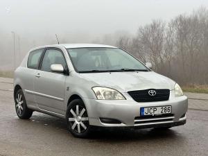 Grey Toyota Corolla 2003 in Vilnius, with an engine capacity of 1.40 L and mileage of 180 thousand km for 699 €, photo 3 on AUTOMOTO.COM.LV