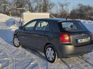Pelēks Toyota Corolla 2003 Švenčionys, ar dzinēja tilpumu 2.00 L un nobraukumu 168 tūkst. km par 900 €, foto 3 vietnē AUTOMOTO.COM.LV