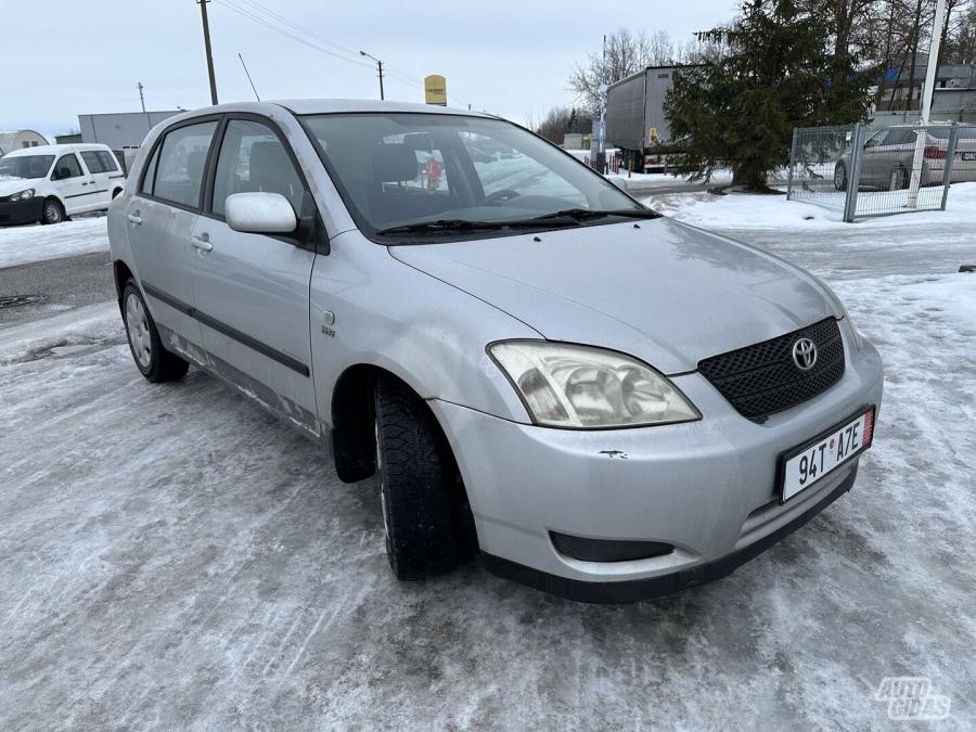 Pelēks Toyota Corolla 2003 Marijampole, ar dzinēja tilpumu 1.60 L un nobraukumu 200 tūkst. km par 2499 €, foto 4 vietnē AUTOMOTO.COM.LV