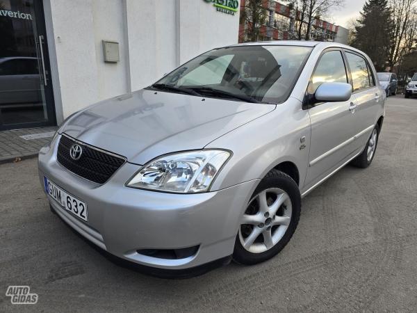 Grey Toyota Corolla 2003 in Kaunas, with an engine capacity of 2.00 L and mileage of 320 thousand km for 1400 €, photo 1 on AUTOMOTO.COM.LV