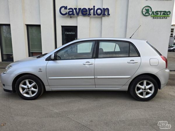 Grey Toyota Corolla 2003 in Kaunas, with an engine capacity of 2.00 L and mileage of 320 thousand km for 1400 €, photo 5 on AUTOMOTO.COM.LV