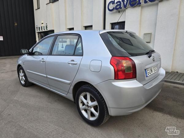 Grey Toyota Corolla 2003 in Kaunas, with an engine capacity of 2.00 L and mileage of 320 thousand km for 1400 €, photo 6 on AUTOMOTO.COM.LV