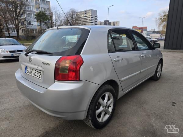 Grey Toyota Corolla 2003 in Kaunas, with an engine capacity of 2.00 L and mileage of 320 thousand km for 1400 €, photo 8 on AUTOMOTO.COM.LV
