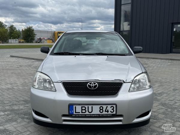 Grey Toyota Corolla 2003 in Panevezys, with an engine capacity of 2.00 L and mileage of 322 thousand km for 1050 €, photo 2 on AUTOMOTO.COM.LV