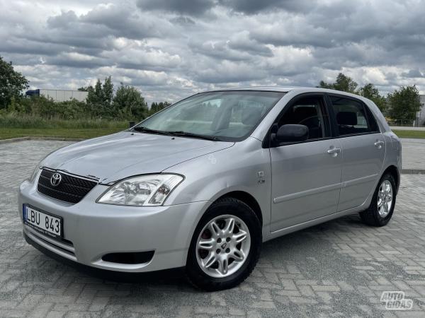Grey Toyota Corolla 2003 in Panevezys, with an engine capacity of 2.00 L and mileage of 322 thousand km for 1050 €, photo 3 on AUTOMOTO.COM.LV