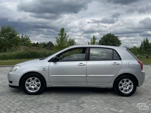 Grey Toyota Corolla 2003 in Panevezys, with an engine capacity of 2.00 L and mileage of 322 thousand km for 1050 €, photo 5 on AUTOMOTO.COM.LV