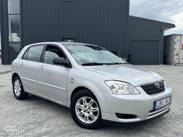 Grey Toyota Corolla 2003 in Panevezys, with an engine capacity of 2.00 L and mileage of 322 thousand km for 1050 €, photo 3 on AUTOMOTO.COM.LV
