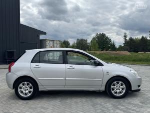 Pelēks Toyota Corolla 2003 Panevēža, ar dzinēja tilpumu 2.00 L un nobraukumu 322 tūkst. km par 1050 €, foto 5 vietnē AUTOMOTO.COM.LV