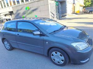 Grey Toyota Corolla 2003 in Vilnius, with an engine capacity of 1.40 L and mileage of 160 thousand km for 1000 €, photo  on AUTOMOTO.COM.LV