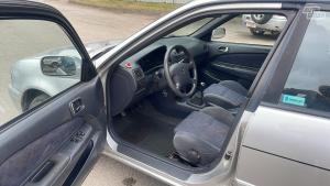 Pelēks Toyota Corolla 2003 Marijampole, ar dzinēja tilpumu 2.00 L un nobraukumu 200 tūkst. km par 1100 €, foto 10 vietnē AUTOMOTO.COM.LV