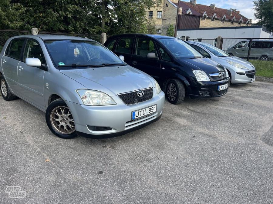 Grey Toyota Corolla 2003 in Siauliai, with an engine capacity of 2.00 L and mileage of 0 thousand km for 939 €, photo 1 on AUTOMOTO.COM.LV