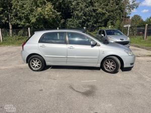 Grey Toyota Corolla 2003 in Siauliai, with an engine capacity of 2.00 L and mileage of 0 thousand km for 939 €, photo 6 on AUTOMOTO.COM.LV