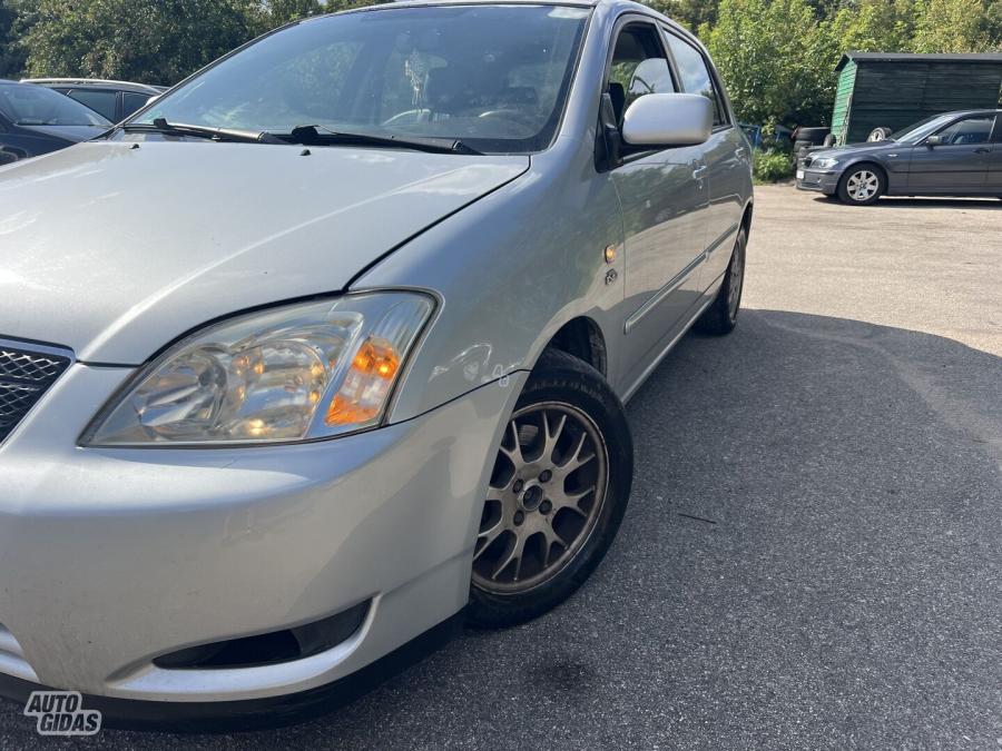 Grey Toyota Corolla 2003 in Siauliai, with an engine capacity of 2.00 L and mileage of 0 thousand km for 939 €, photo 11 on AUTOMOTO.COM.LV