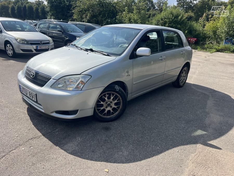 Pelēks Toyota Corolla 2003 Šauļi, ar dzinēja tilpumu 2.00 L un nobraukumu 0 tūkst. km par 939 €, foto 3 vietnē AUTOMOTO.COM.LV