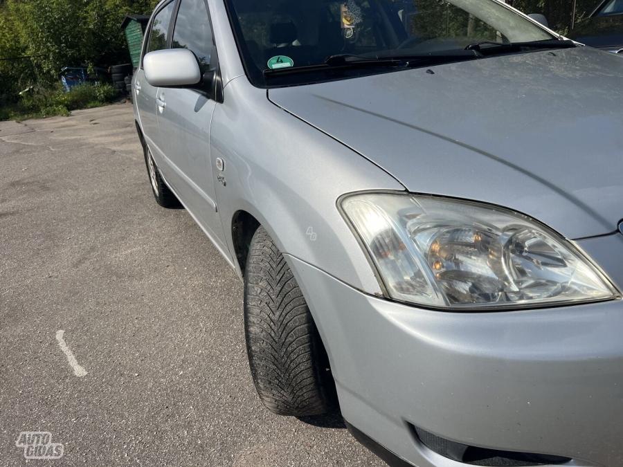 Pelēks Toyota Corolla 2003 Šauļi, ar dzinēja tilpumu 2.00 L un nobraukumu 0 tūkst. km par 939 €, foto 12 vietnē AUTOMOTO.COM.LV