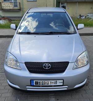 Pelēks Toyota Corolla 2003 Viļņa, ar dzinēja tilpumu 2.00 L un nobraukumu 196 tūkst. km par 1250 €, foto  vietnē AUTOMOTO.COM.LV