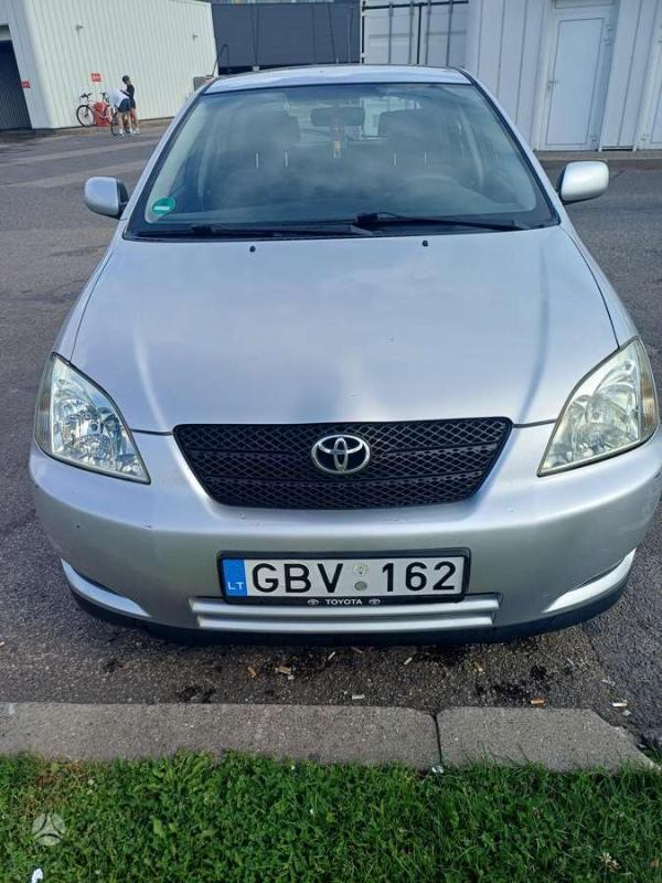Grey Toyota Corolla 2003 in Vilnius, with an engine capacity of 1.50 L and mileage of 146 thousand km for 1500 €, photo 1 on AUTOMOTO.COM.LV