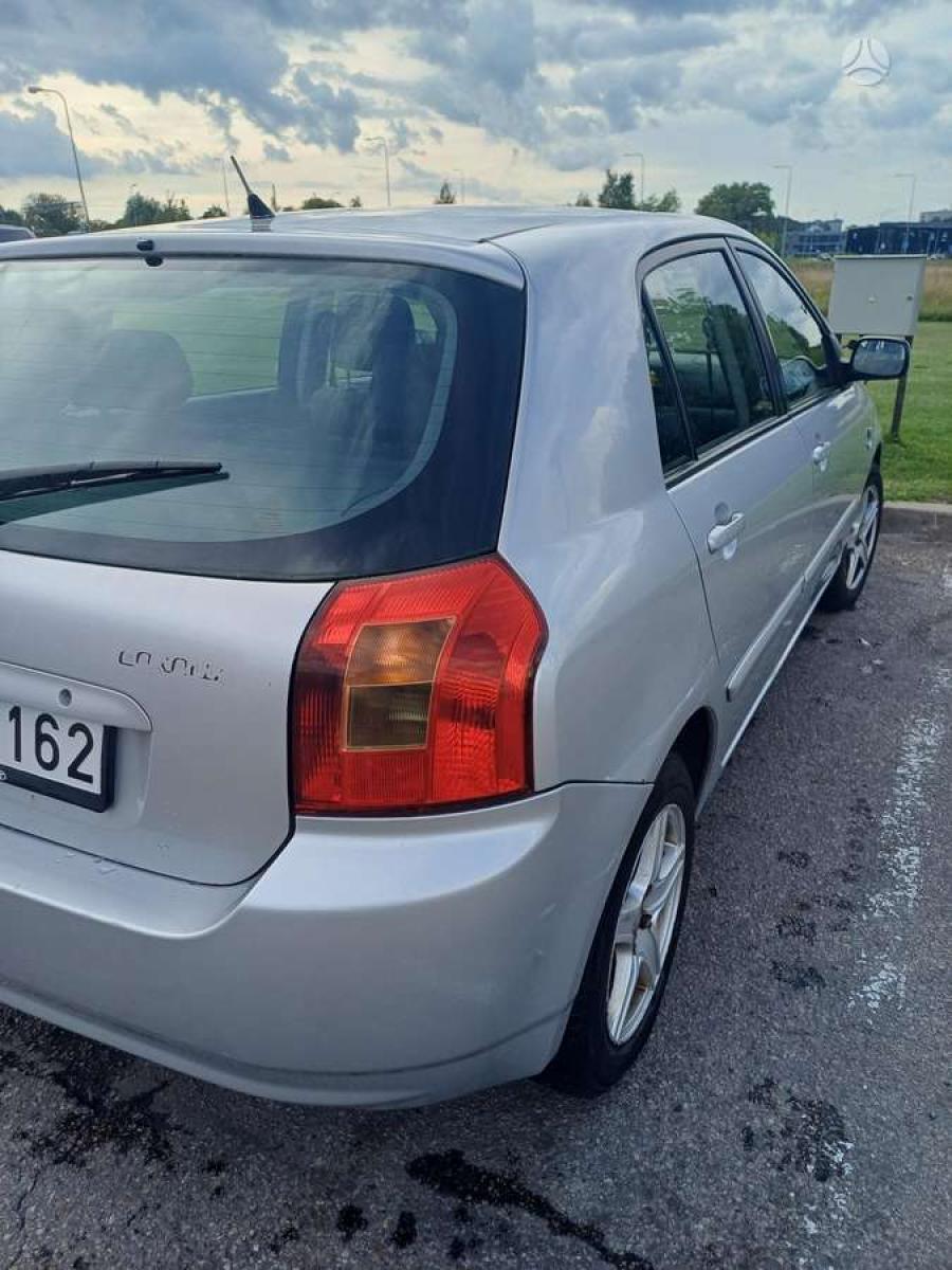 Grey Toyota Corolla 2003 in Vilnius, with an engine capacity of 1.50 L and mileage of 146 thousand km for 1500 €, photo 6 on AUTOMOTO.COM.LV