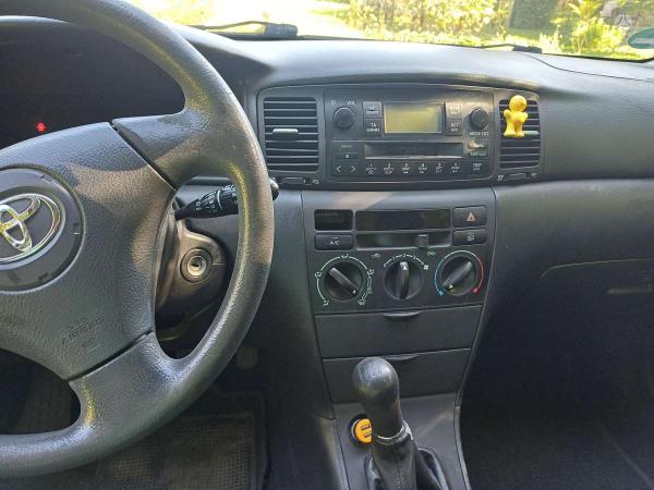 Grey Toyota Corolla 2003 in Vilnius, with an engine capacity of 1.50 L and mileage of 146 thousand km for 1500 €, photo 8 on AUTOMOTO.COM.LV