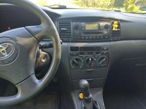 Grey Toyota Corolla 2003 in Vilnius, with an engine capacity of 1.50 L and mileage of 146 thousand km for 1500 €, photo 8 on AUTOMOTO.COM.LV